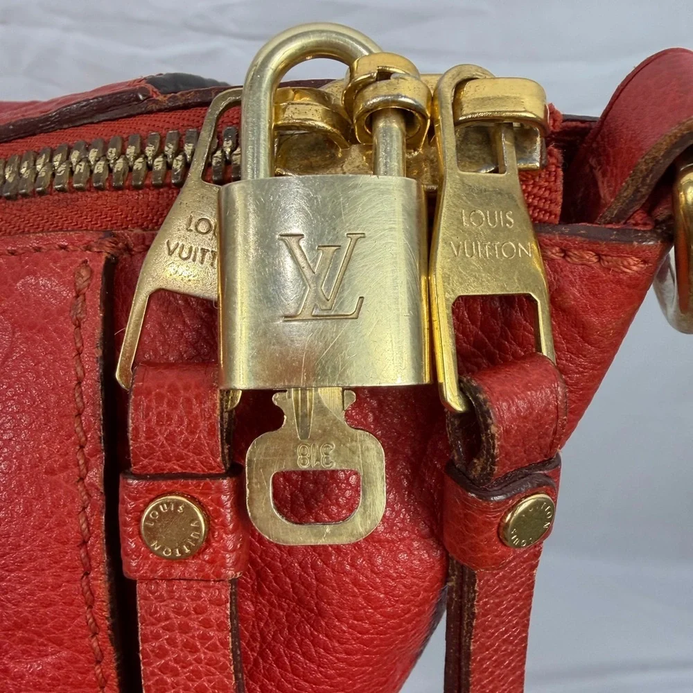 Louis Vuitton | Bags | Louis Vuitton Lumineuse Pm Red Empreinte Tote ...